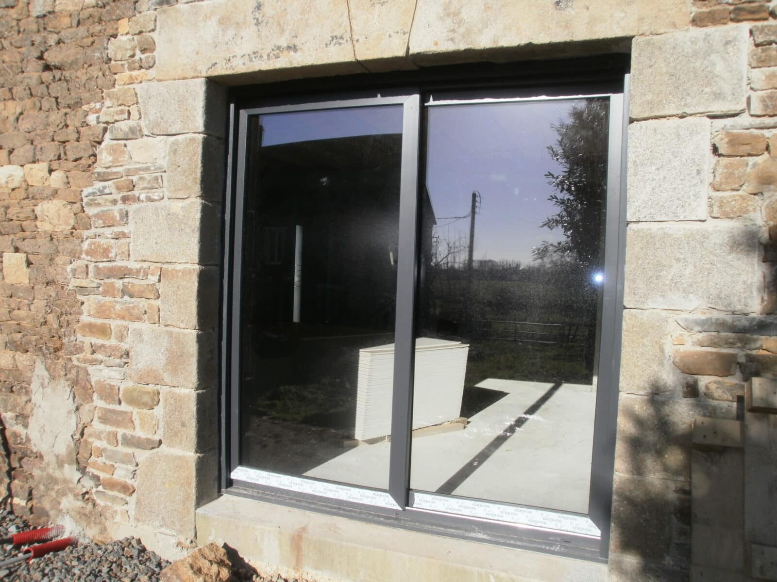 Baie vitrée coulissante en PVC couleur anthracite - PROCLAIR